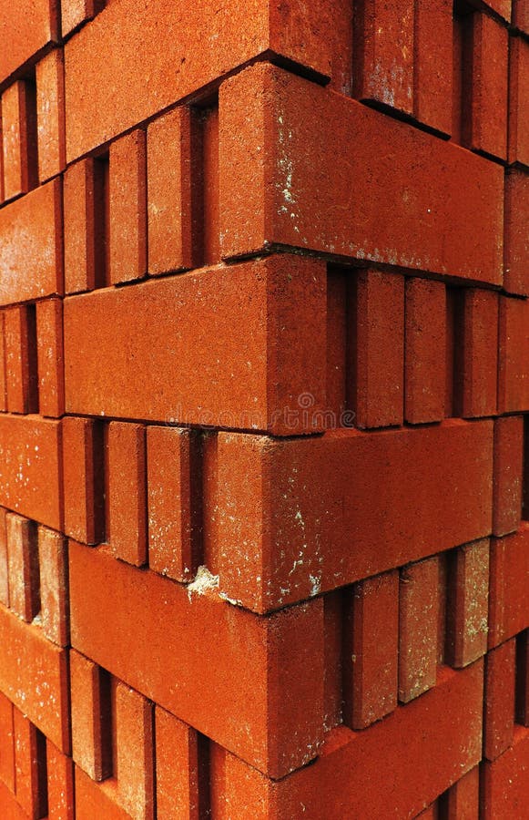 Stack of red clay bricks stock image. Image of clay - 100654989