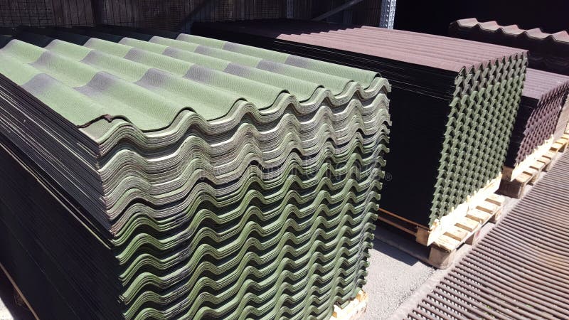 A Stack of Red and Green Colors Ondulin Sheets. Modern Roofing Material ...