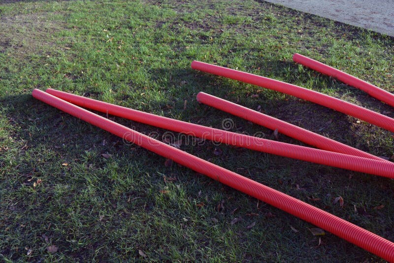 Stack Red Plastic Electricity Cable Protection Pipes Stock Photo ...