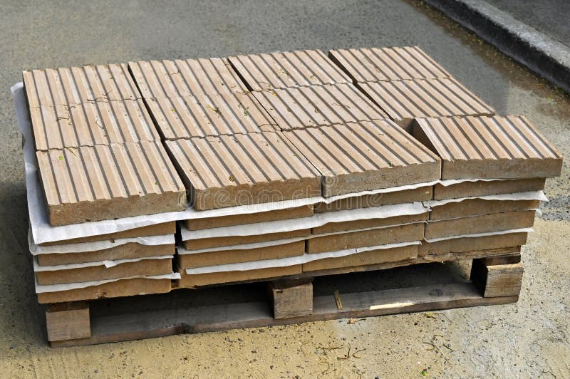 Stack of red tactile tiles stock photo. Image of engineering - 318814938