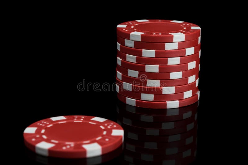 Stack of Red and White Poker Chips on a Black Background Close-up Stock ...