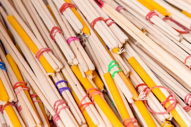 Stack of Red and Yellow Incense Sticks in a Buddhist Temple.Thai Stock ...