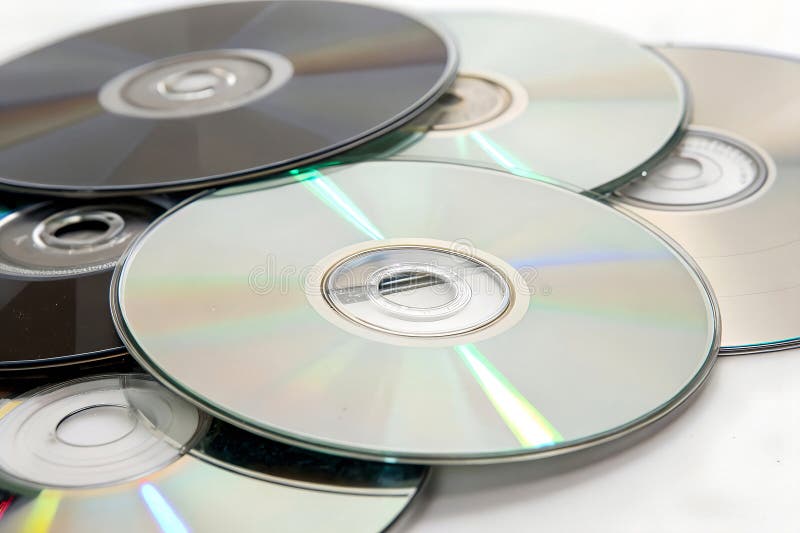 Stack of Reflective Compact Discs with Rainbow Light Reflections on ...