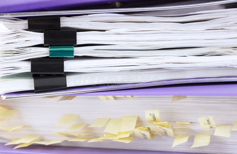 Stack of Reporting Paper Documents in a Purple Folder with Bookmarks ...