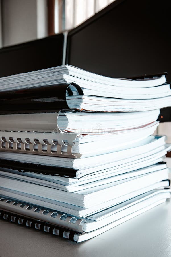 Stack of Reports Lies on a Desk Ready for Review Stock Image - Image of ...