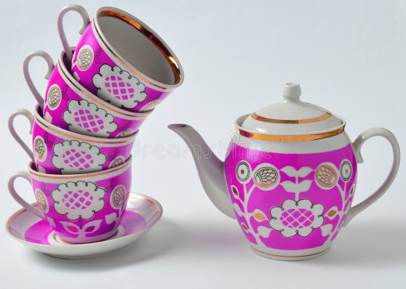 Stack of Retro Cups and Teapot on a White Background. Stock Image ...