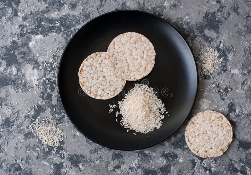 Stack Rice Bread Rice Bread Rice on a Black Plate from Above Stock ...