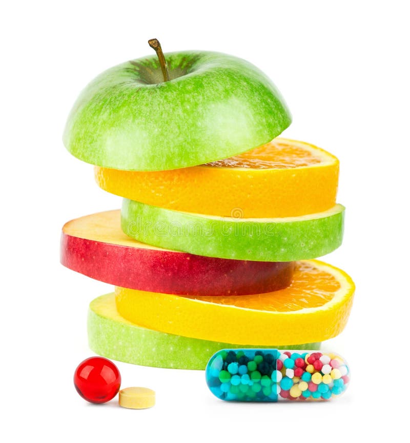 Stack of Ripe Fruit Slices with Vitamins on White Background Stock ...
