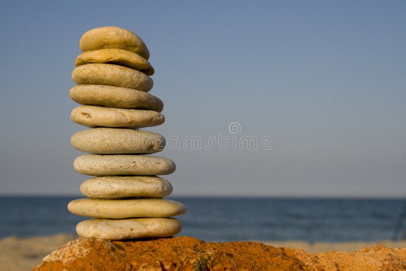 Three Stone Stacks on Pebble Beach Stock Photo - Image of beauty ...
