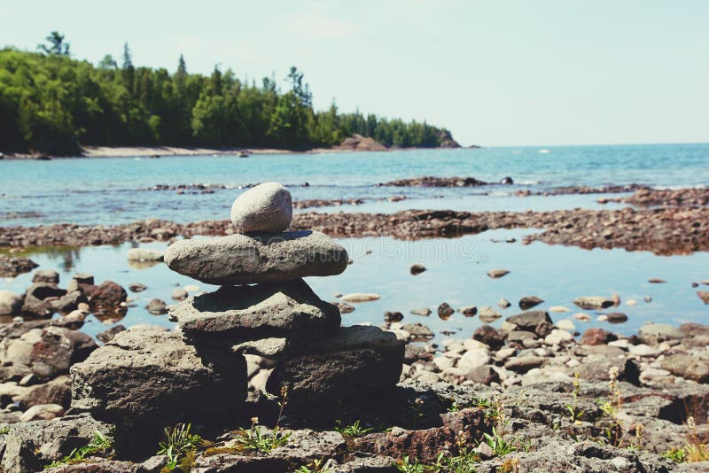 Stack of Spa Rocks on Wood Against Blue Sky Stock Photo - Image of ...