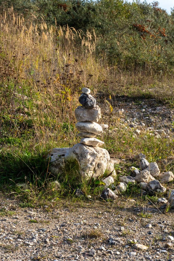 A Stack of Rocks is on the Ground in a Field Stock Image - Image of ...