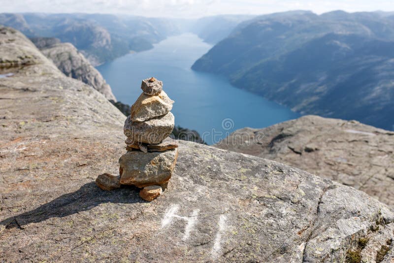 Stack of Rocks with Mountain and Fjord View Stock Image - Image of ...