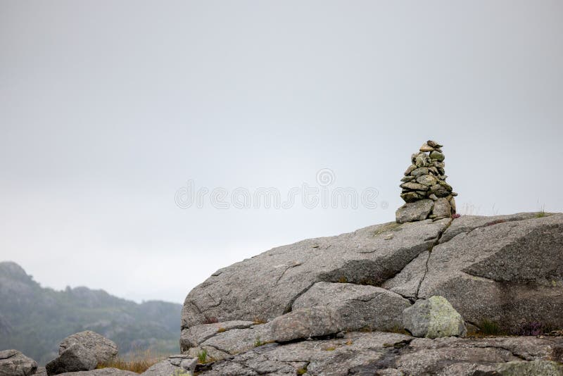 Stack of Rocks Standing in Balance on Top of a Cliff, the Concept of ...