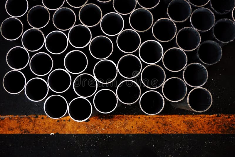 Stack of round metal tube stock image. Image of reflection - 57050515