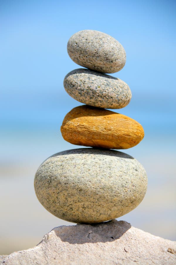 A Stack of Round Rocks by the Sea Stock Image - Image of round, stress ...