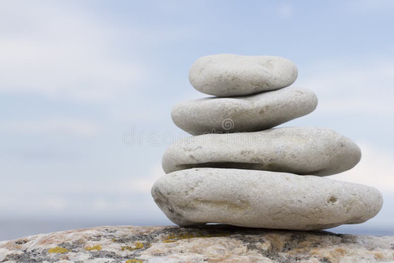 Stack Of Round Smooth Stones On A Seashore Stock Photo - Image of ...
