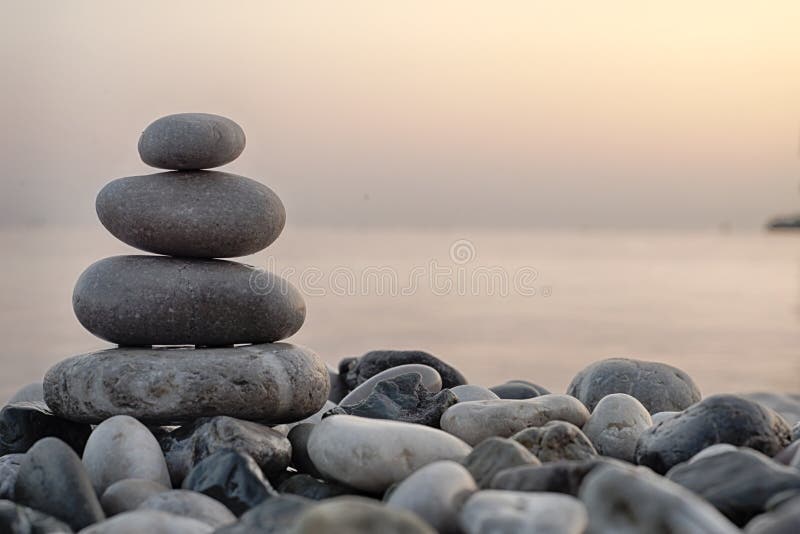 Stack of Round Smooth Stones on a Seashore Stock Photo - Image of heap ...