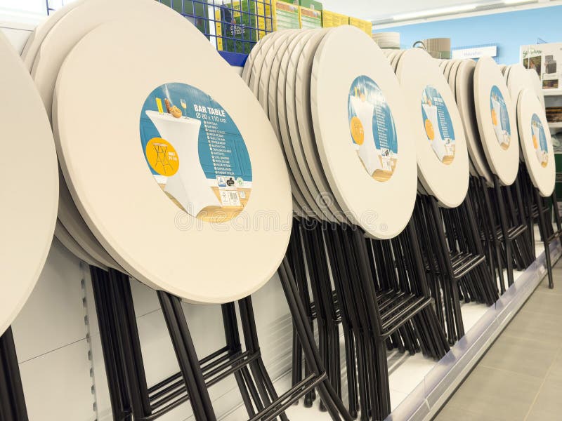 Stack of Round White Folding Tables in a Store Aisle Editorial Image ...