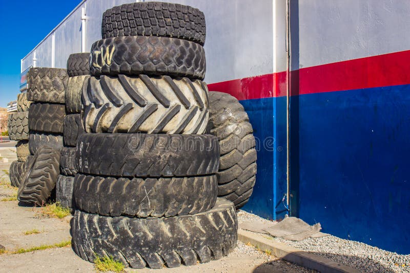 Stack of Rubber Old Tires Outside Store Stock Image - Image of good ...