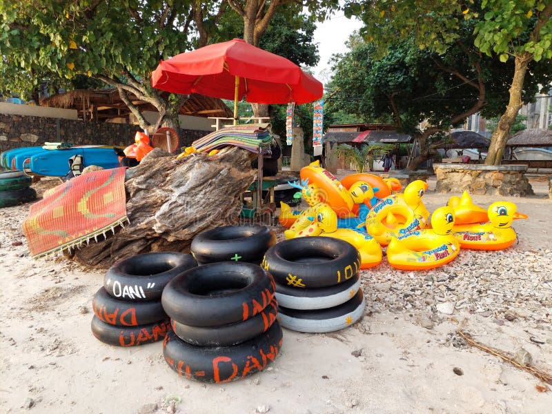 Stack of Rubber Tires from a Beach Stock Image - Image of tires, tube ...