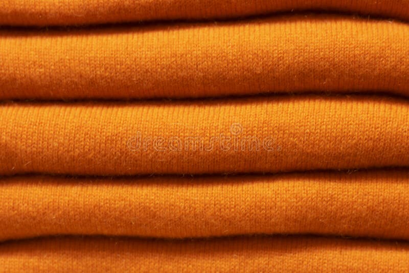 Stack of Russet Orange Woolen Knitted Sweaters Close-up, Texture ...