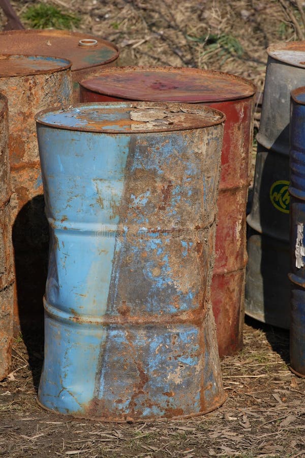 Stack of rusting barrels stock photo. Image of containers - 8805558