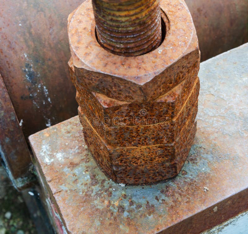 Stack of Rusting Nuts on a Bolt Stock Image - Image of bolt, misaligned ...