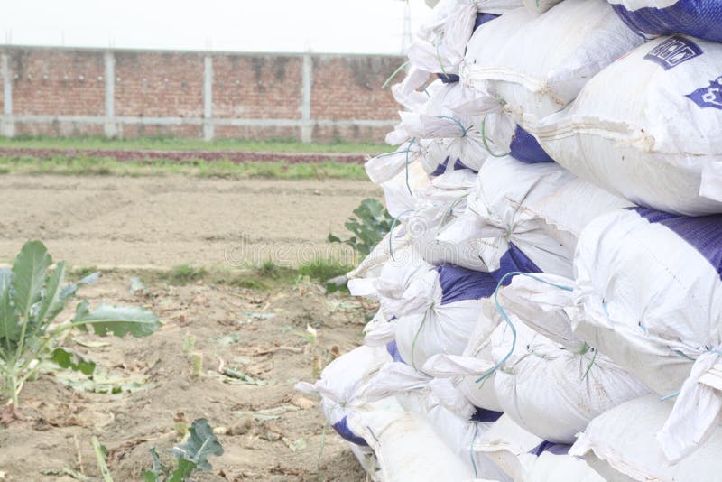 A Stack of Sacks of Crop Fertilizer Stock Image - Image of crop, farm ...