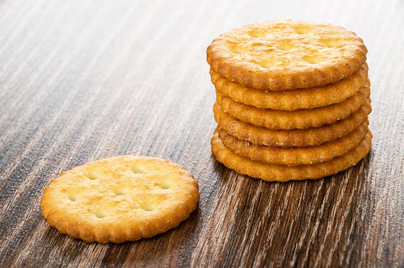Stack of Salted Crackers on Wooden Table Stock Image - Image of cracker ...