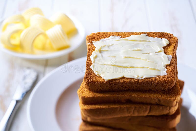 Stack of Sandwich Bread Slices with Butter, Selective Focus Stock Photo ...