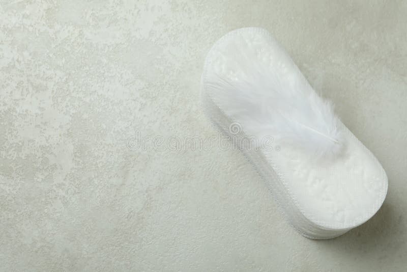 Stack of Sanitary Pads on White Textured Background Stock Photo - Image ...