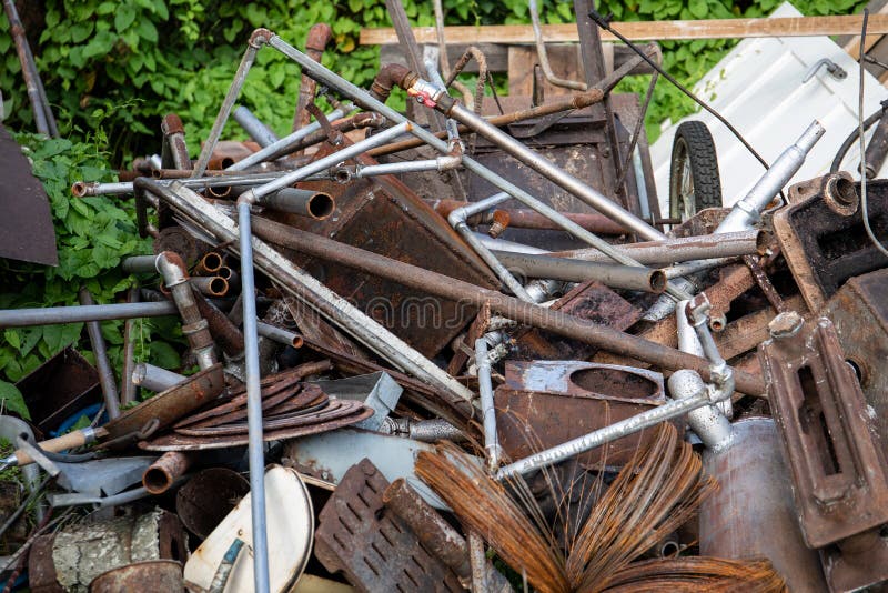 Stack of Scrap Metal, Rusty Pipes and Wires Outdoors. Recycling and ...