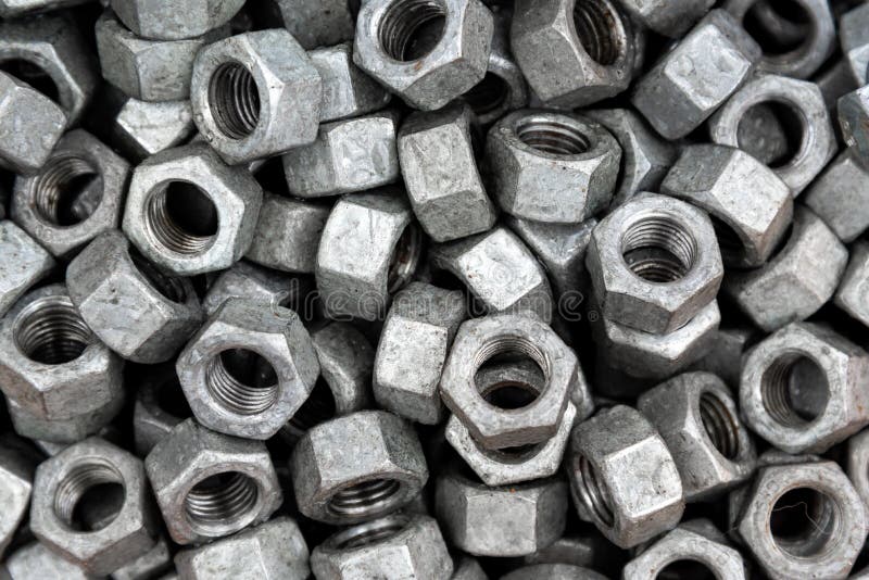 Stack of Nuts stock photo. Image of material, mechanical - 30001628