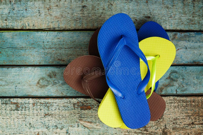 Stack of Several Pairs of Multi-colored Rubber Flip Flops on a B Stock ...