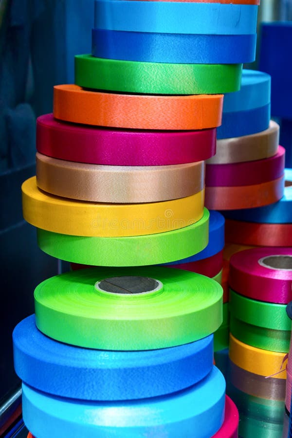 A Stack of Rolls of Multi-colored Ribbon Stock Photo - Image of ...