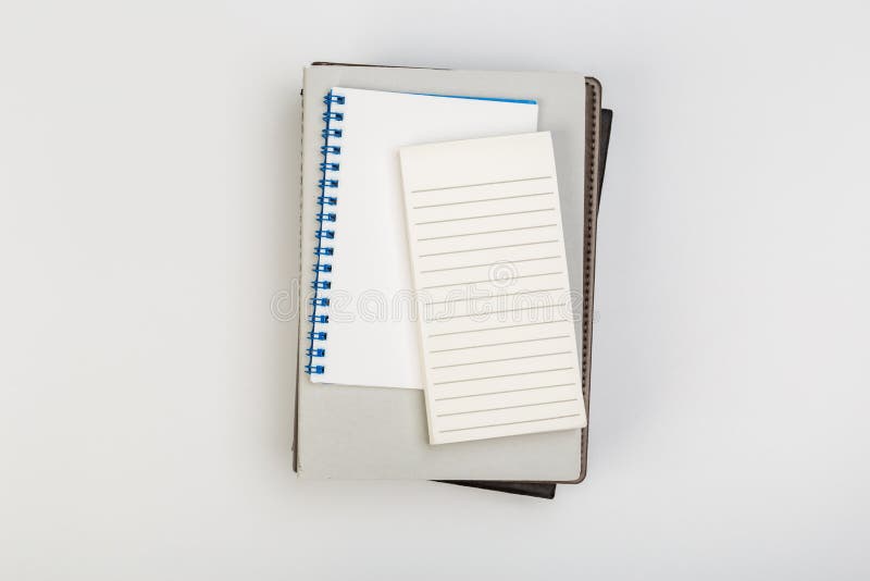 Stack of Colorful Notebooks with Pen Isolated on White Background Stock ...