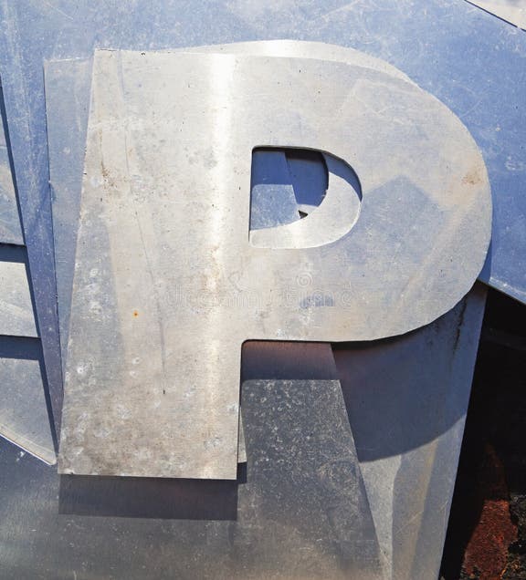 Stack of Sheet Metal Letters Stock Photo - Image of signs, stack: 12942354