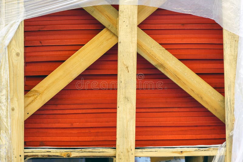 Stack of Sheets of Red Polymeric Materials in a Wooden Frame Stock ...