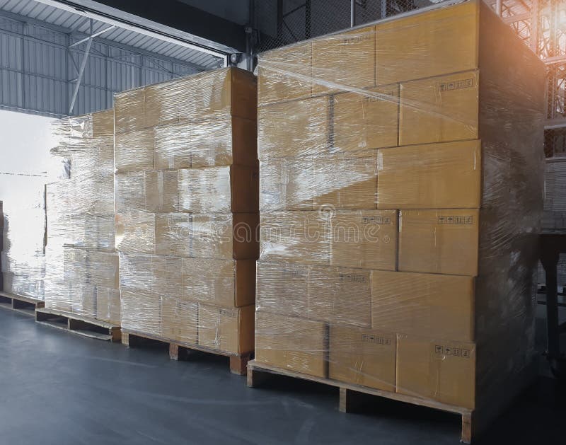 Stack of Shipment Boxes on Wooden Pallet. Cargo & Shipping Warehousing ...