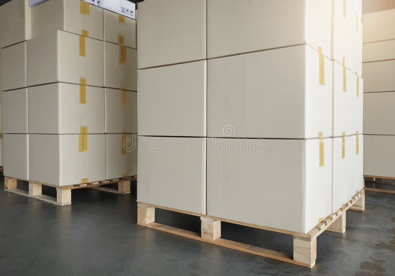 Stack of Shipments Boxes on Pallet Waiting for Load into a Truck. Road ...