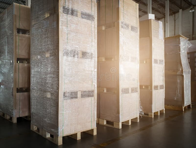 Stack of Shipments Boxes on Wooden Pallets. Interior of Warehouse ...