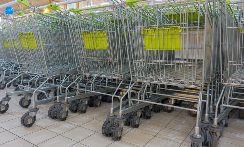Stack of Shopping Carts Near Supermarket. Stock Photo - Image of mall ...