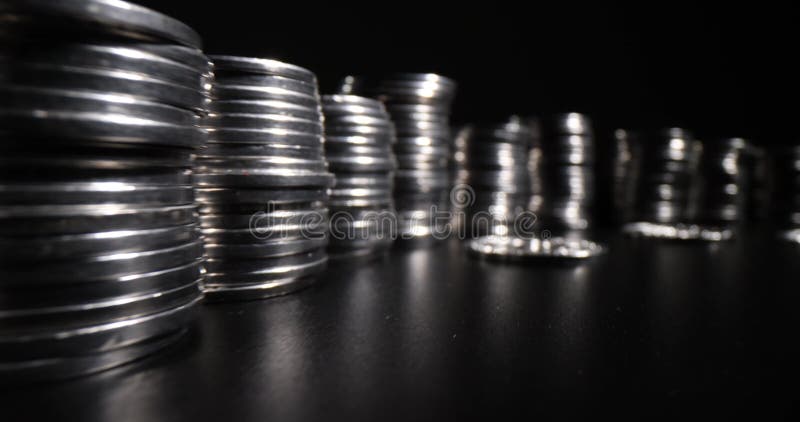 Stack of Silver Coins on Black Background Stock Footage - Video of ...
