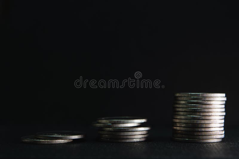 Stack of Silver Coins on Black Stock Photo - Image of earnings ...