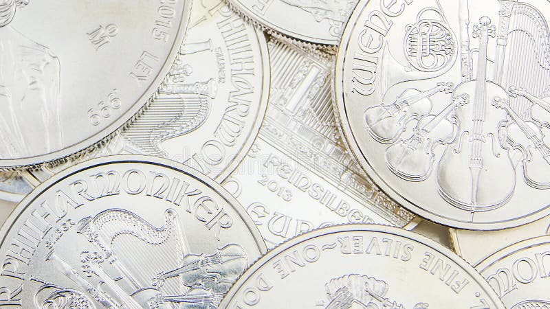 Stack of silver coins stock photo. Image of earnings - 61410636