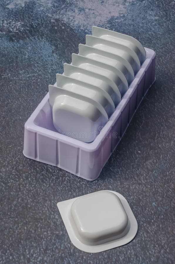 Stack of Single-use Plastic Containers for Sauce or Detergent Stock ...