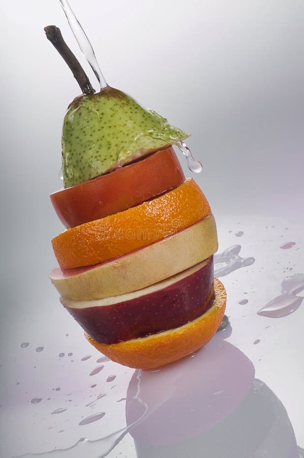 A Stack of Sliced Fruits stock photo. Image of food, slices - 39511866