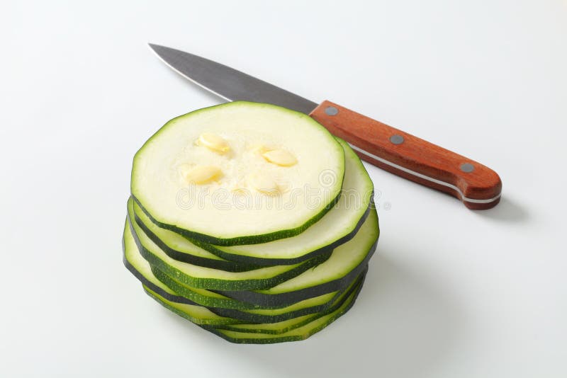 Stack of Sliced Zucchini with a Knife Stock Photo - Image of courgette ...