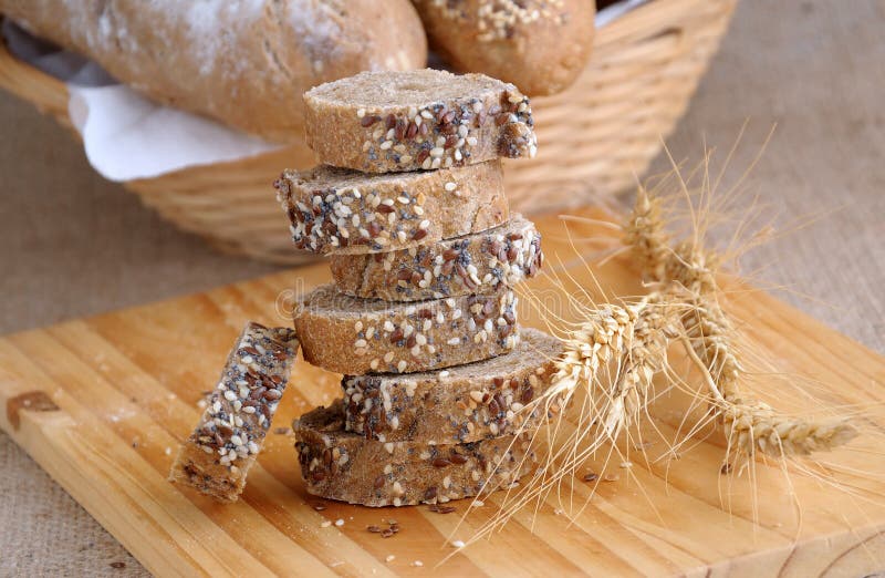 A Stack of Slices of Bread with Grains Stock Photo - Image of bakery ...