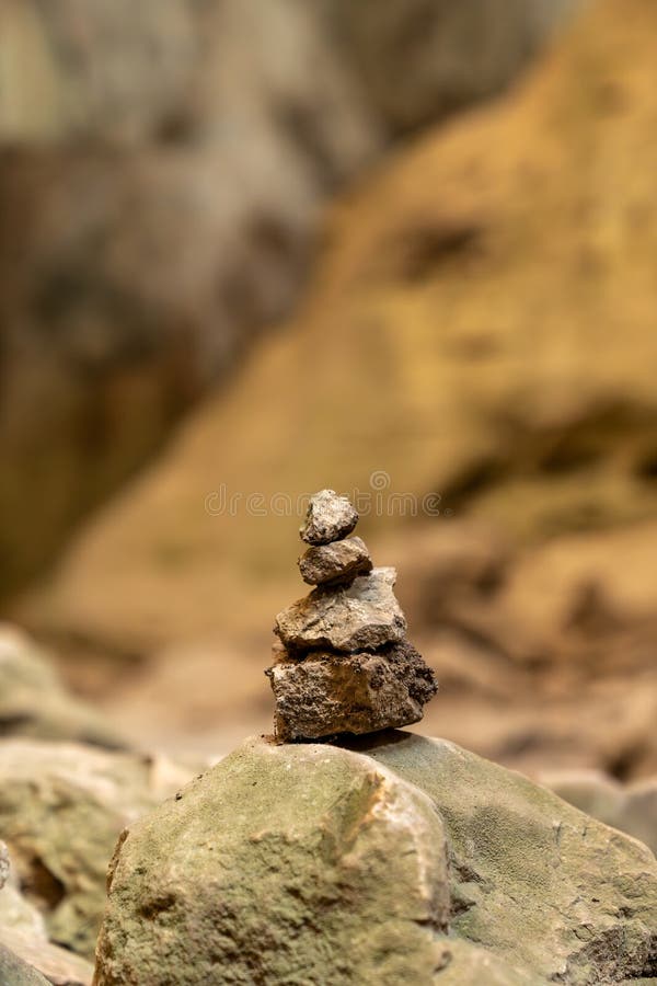Stack of Small Balancing Rocks Creating Zen Atmosphere in Mountain Cave ...